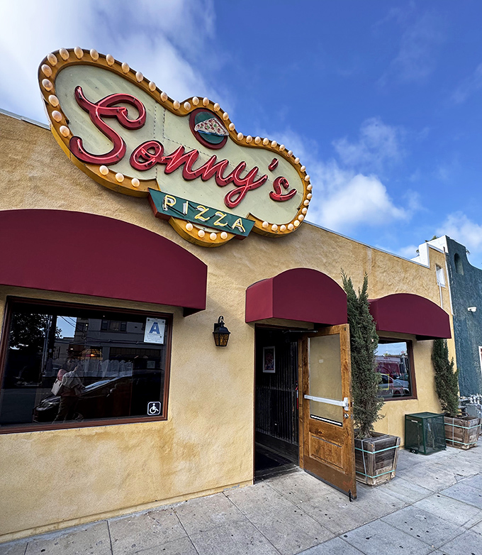 Retro vibes and serious pizza credentials. Sonny's sun-washed facade houses old-school pizza perfection.