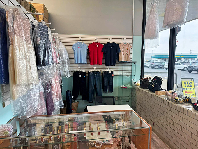 Inside the market, organized racks hold formal wear and everyday clothes at prices that make shopping feel like winning.