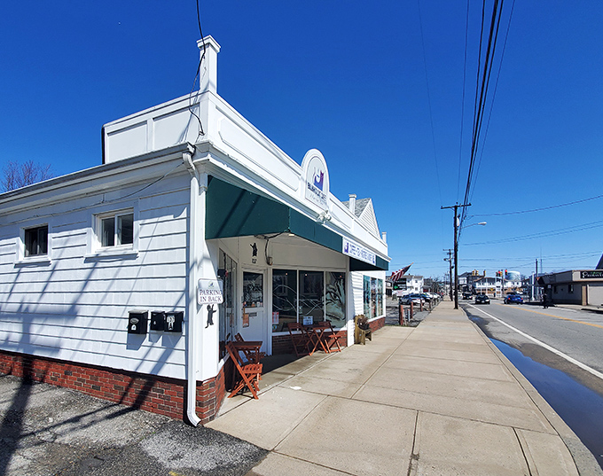 This crisp white Tiverton storefront with its jaunty green awning looks ready to star in its own Hallmark movie about small-town business owners finding love.