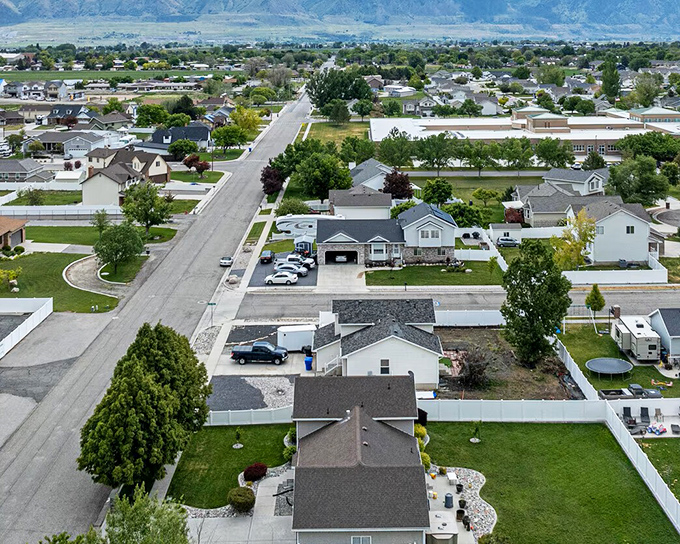 Suburban streets lead toward mountains that make every commute feel like vacation.