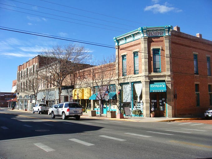 Historic buildings frame mountain views in a town where Old West elegance meets modern retirement comfort perfectly.