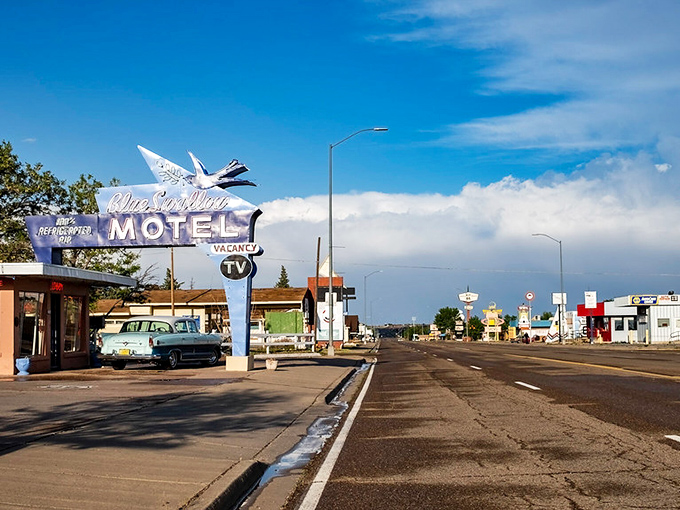 The Mother Road runs straight through Tucumcari, carrying dreams and travelers toward horizons that never seem to end.