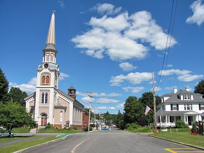 This ornate church spire reaches skyward, anchoring West Brookfield's spiritual and architectural heritage.