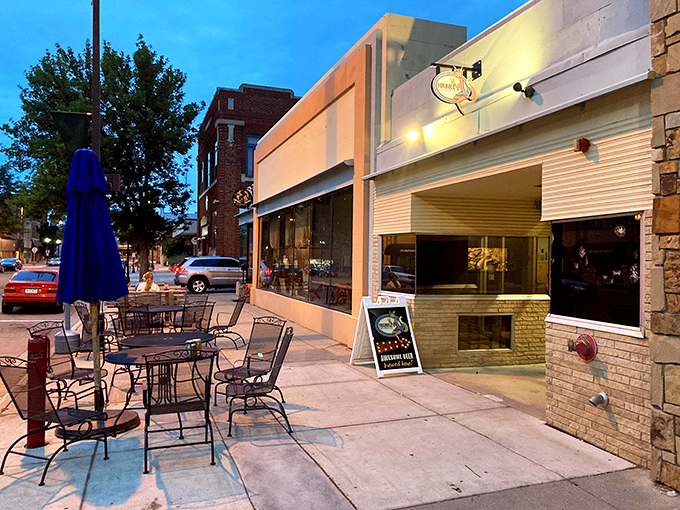 Evening light warms the downtown streets where local businesses still believe in fair prices for honest neighbors.