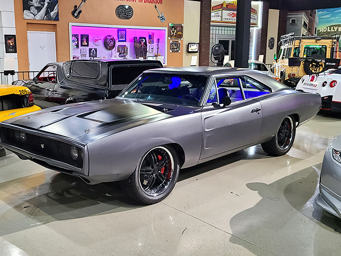 The sleek silver 1970 Dodge Charger exudes menace and muscle. Even parked, it looks like it's breaking speed limits.