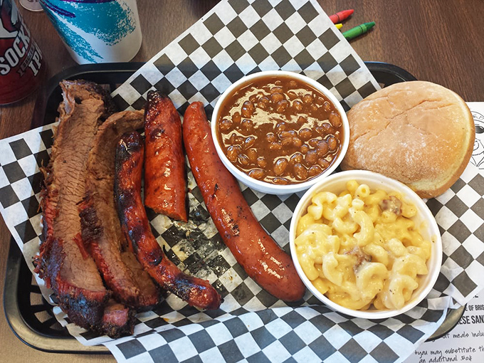 The two-meat plate—where decision anxiety transforms into the relief of not having to choose between BBQ favorites. Those beans mean business.