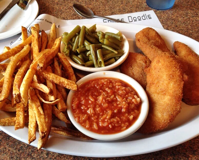 The perfect harmony of crispy tenders, tangy hot sauce, fresh coleslaw, and hand-cut fries &ndash; a plate that makes you wonder why you'd ever eat anywhere else.
