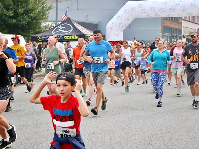 Wallace's community spirit shines during its annual fun run, where participants of all ages dash through historic streets that have witnessed far more dramatic races against time.