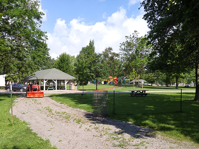 Ada Park's gazebo has witnessed countless picnics, proposals, and community gatherings under its protective wooden embrace.