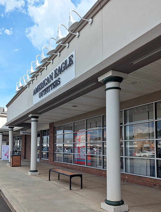 American Eagle Outfitters offers a classic storefront with thoughtful bench placement&mdash;because shopping stamina requires strategic rest stops.