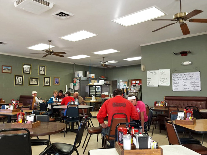 Reclaimed wood walls and everyday tables create the kind of honest atmosphere where good food feels even better somehow.