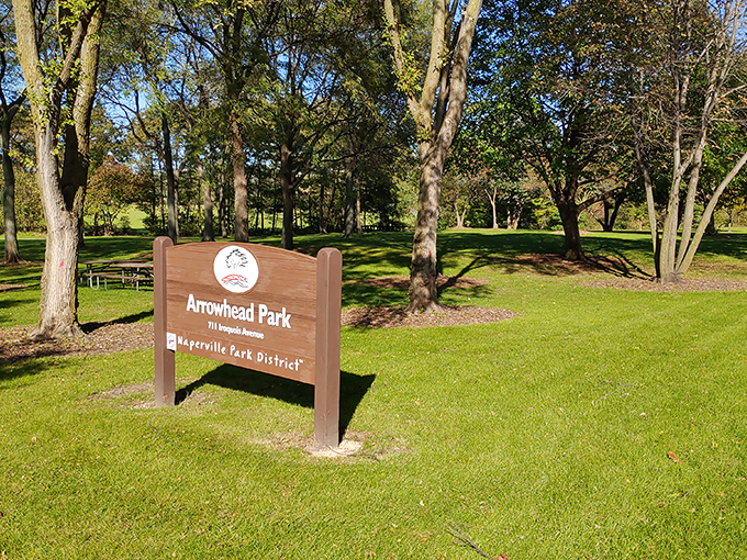 Arrowhead Park's entrance sign promises the simple pleasures of open green spaces&mdash;nature's antidote to doom-scrolling and inbox anxiety.