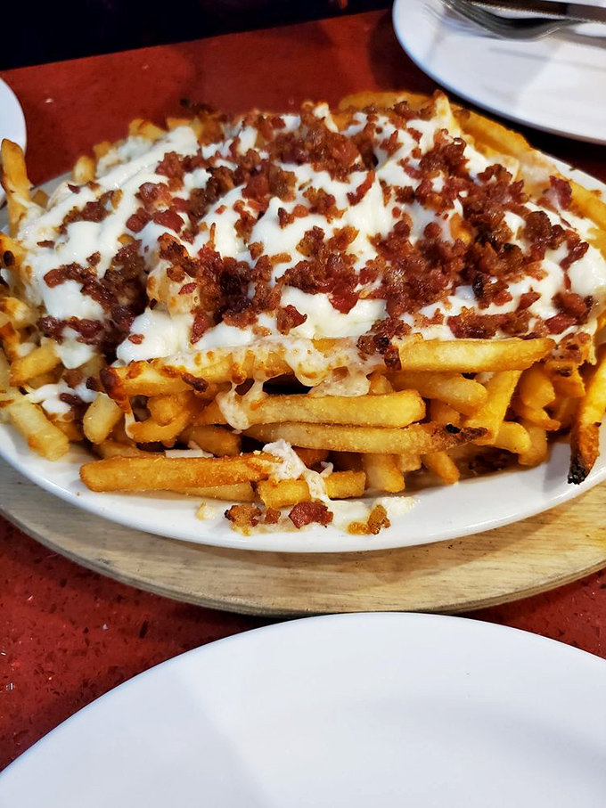 These aren't just cheese fries&mdash;they're a loaded potato masterpiece that makes you question why you'd eat fries any other way.