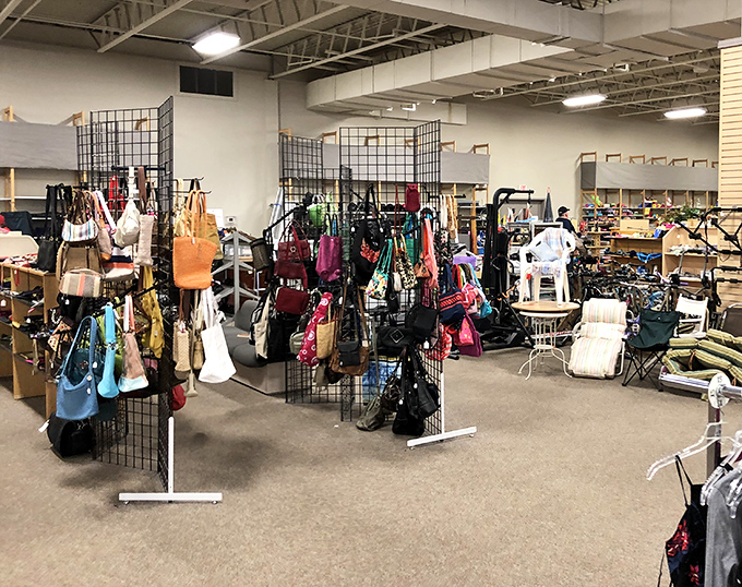 Handbag heaven&mdash;where designer purses and practical totes hang in suspended animation, dreaming of future shopping trips.