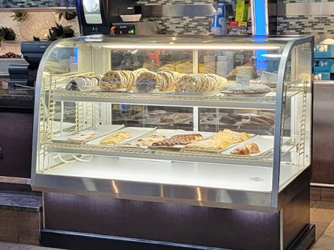 The dessert case&mdash;where willpower goes to die and "I'll just have coffee" turns into "and a slice of that... and that."