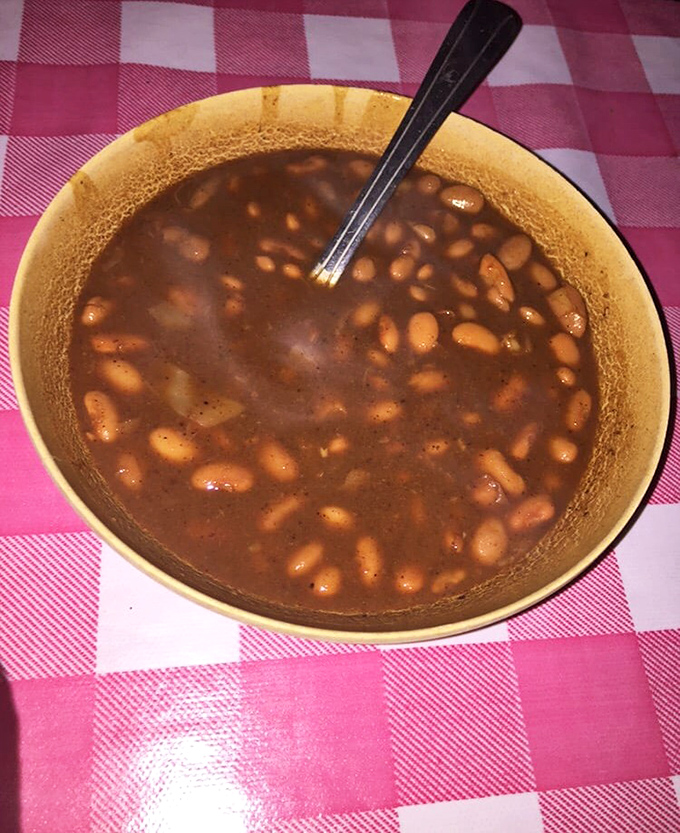 These aren't your average beans from a can&mdash;they've been simmering with secret ingredients until they've achieved side dish stardom.