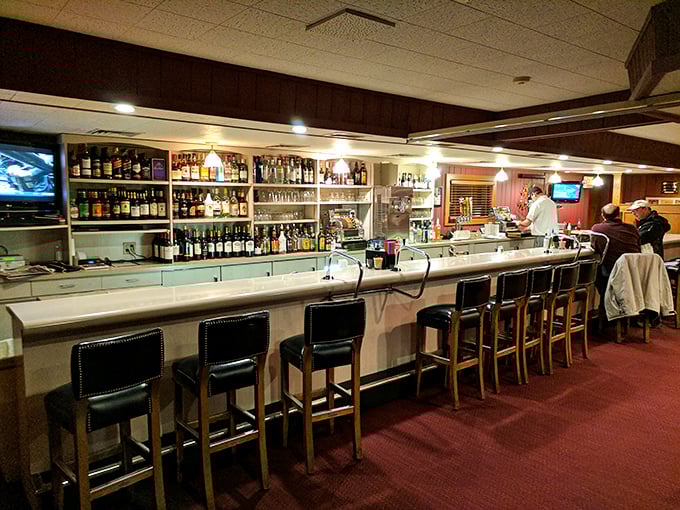 A bar that knows exactly what it's doing&mdash;no mixology theatrics needed. Those bottles aren't just spirits&mdash;they're old friends waiting to be reacquainted.