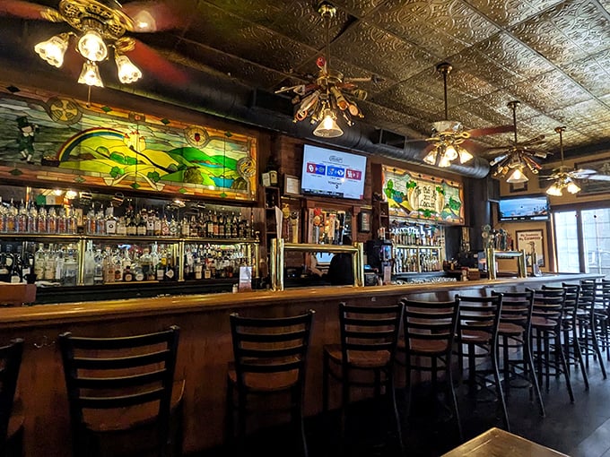 The bar area gleams with promise, backed by stunning stained glass that filters light through scenes of Irish countryside &ndash; liquid art behind liquid art.