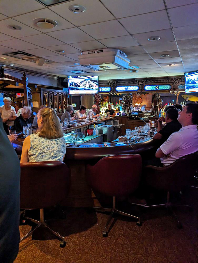 The horseshoe bar where strangers become friends, bartenders become therapists, and perfectly mixed old-fashioneds become the solution to life's little problems.