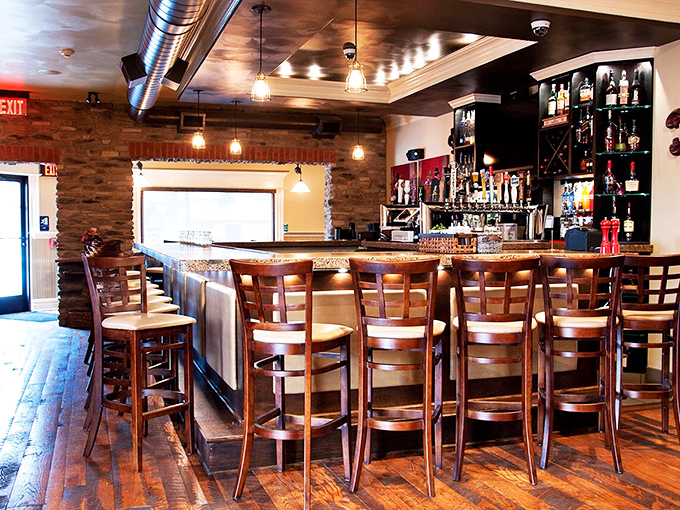 A bar that invites lingering conversations and second rounds, where bourbon flows and friendships grow.