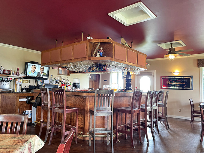 A bar that understands priorities: good drinks, good company, good TV. The kind of place where everybody might actually know your name.