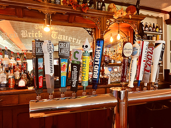 The bar area gleams with history and promise – those tap handles standing at attention like eager storytellers waiting to pour you something local.
