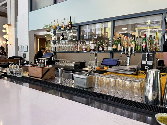 The bar at Speck isn't just where drinks are made&mdash;it's command central for liquid happiness, with enough bottles to survive any apocalypse in style.