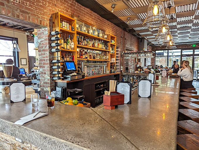 The bar doesn't just serve drinks&mdash;it showcases them against exposed brick like liquid art installations waiting to be appreciated.