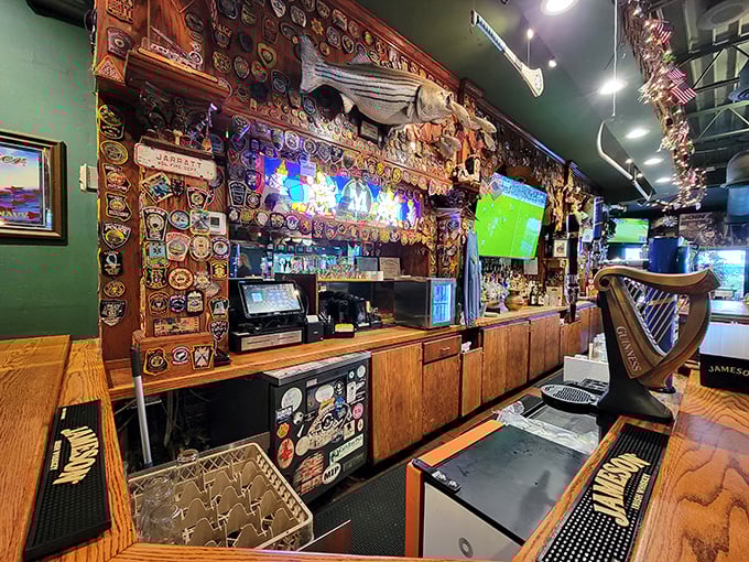 The bar area showcases decades of collected memories&mdash;patches, flags, and memorabilia creating an atmosphere that feels earned rather than manufactured.