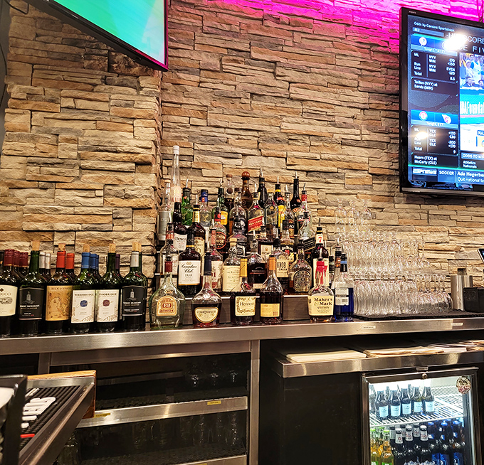 The well-stocked bar promises libations to complement your seafood feast. Those stone walls aren't just for show&mdash;they're holding back a tide of premium spirits.