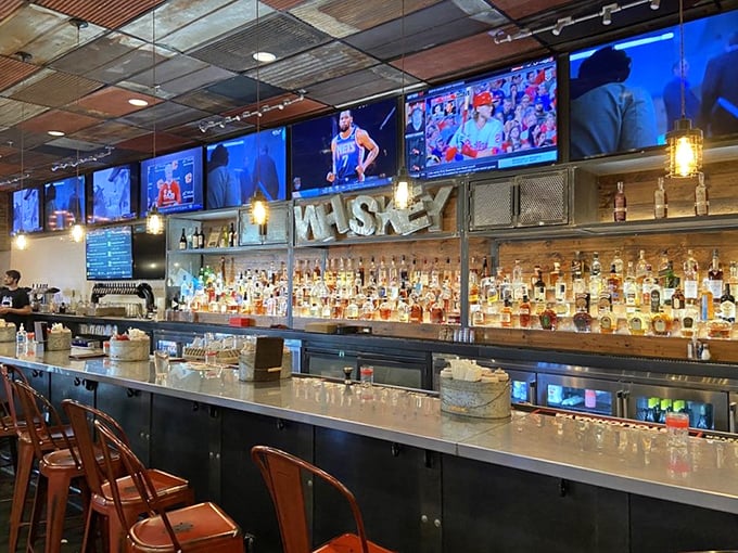 A bar that whispers "stay awhile" with enough whiskey bottles to make Sinatra jealous.