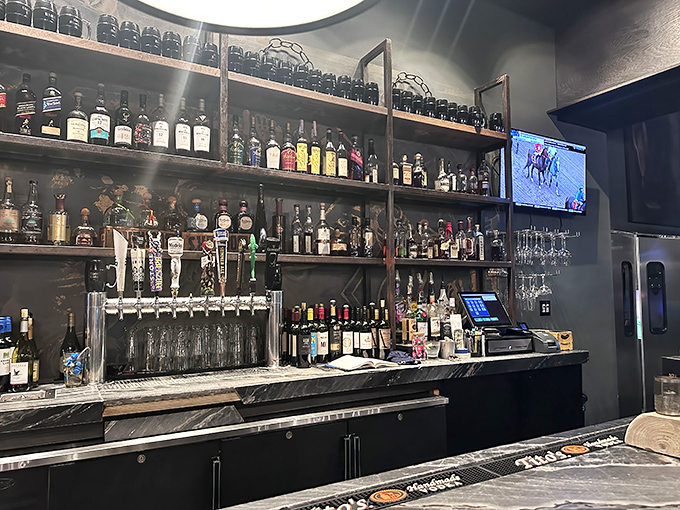 A bar stocked better than most people's retirement portfolios. Those gleaming bottles promise libations that pair perfectly with stories that get better with each telling. 