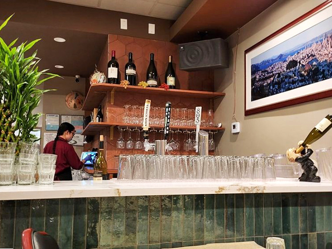 The bar area balances efficiency with elegance, promising libations that complement rather than compete with the seafood stars.