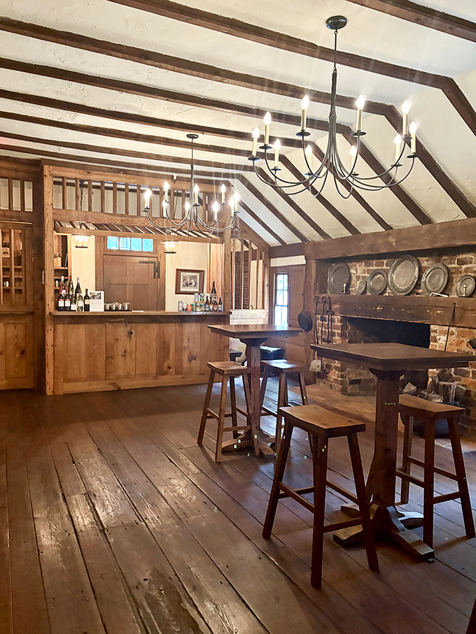 The bar area whispers tales of travelers past while serving up spirits to modern-day adventurers seeking refreshment.
