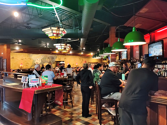 The multicolored floor tiles have witnessed countless first dates, family celebrations, and "I'm too full but let's get one more slice" moments.