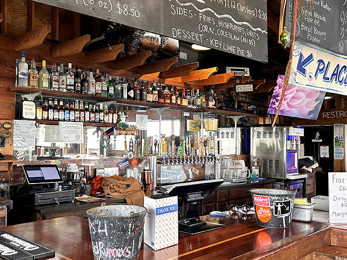 A bar stocked with everything you need to wash down seafood treasures. Nothing fancy, everything necessary.