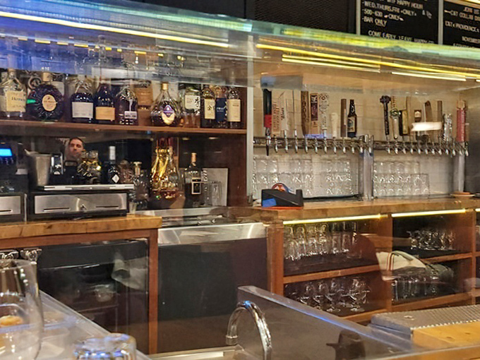 A bar stocked for serious seafood pairing—where the bartenders know the difference between a drink that complements oysters versus one that fights them.