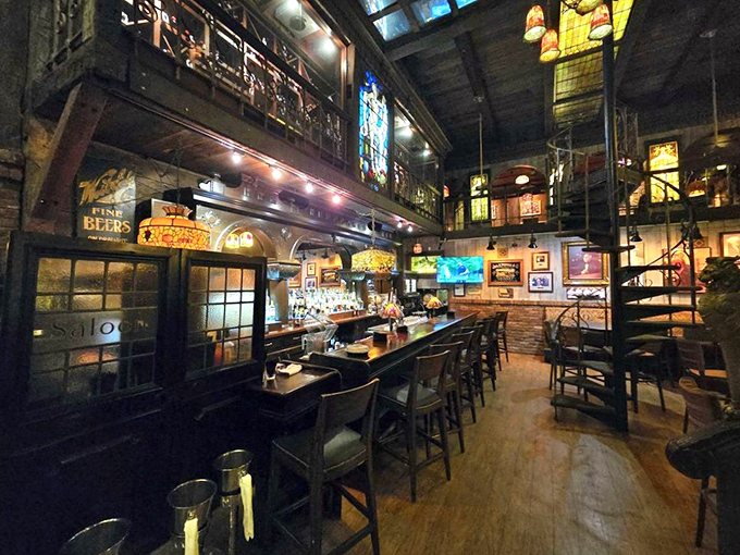 The bar isn't just where drinks are served &ndash; it's a cathedral of conviviality, with stained glass windows illuminating conversations that flow as smoothly as the bourbon.