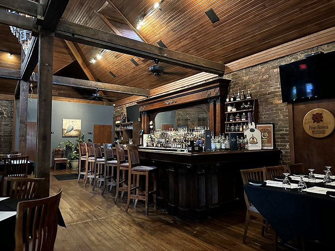 A bar that understands bourbon isn't just a drink&mdash;it's a religion. The wooden beams above seem to nod in approval at your excellent life choices.