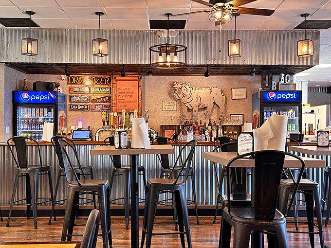 The bar area blends industrial elements with rustic charm, creating the perfect perch to contemplate your next barbecue adventure.