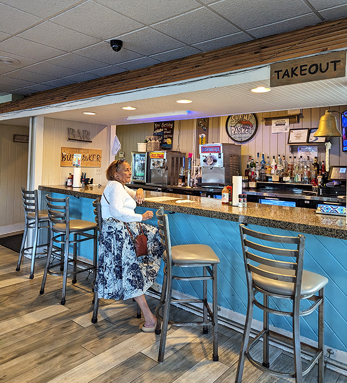 The bar area offers a front-row seat to watch your seafood dreams become delicious reality.
