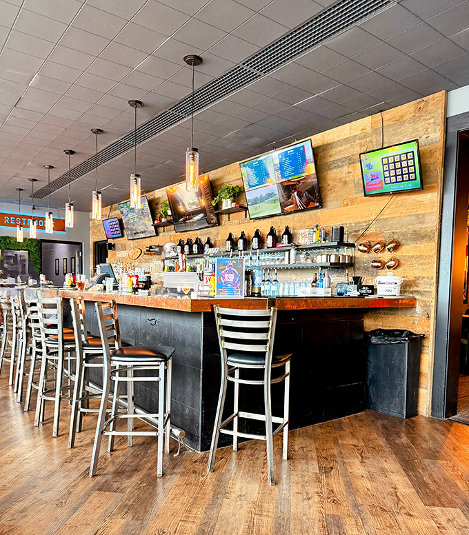 A bar that understands its mission: provide local brews in a setting where wood and metal create the perfect backdrop for decision-making.