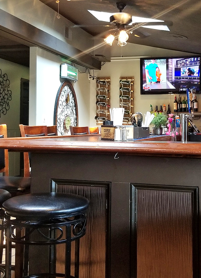 A bar area that invites you to settle in, where the bartender might actually remember your name instead of just your credit card.