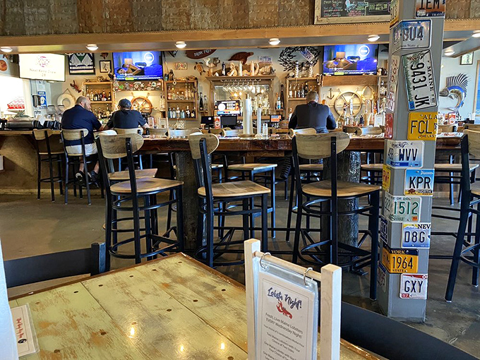 The bar area &ndash; where license plates meet nautical charm, and where decisions between oysters or lobster rolls are debated with scholarly intensity.