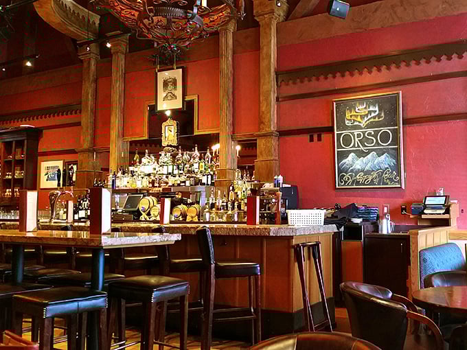 Not just a bar, but a liquid library where Alaskan spirits meet global classics under the watchful gaze of rustic wooden columns.