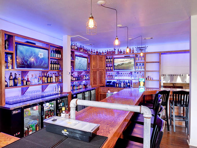 The bar glows blue like a Mississippi juke joint. This is where bourbon meets barbecue in perfect harmony.