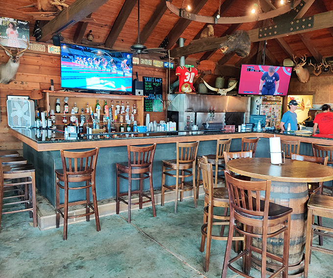 The bar area feels like the kind of place where fishing stories get better with each round &ndash; mounted trophies silently judging the exaggerations.