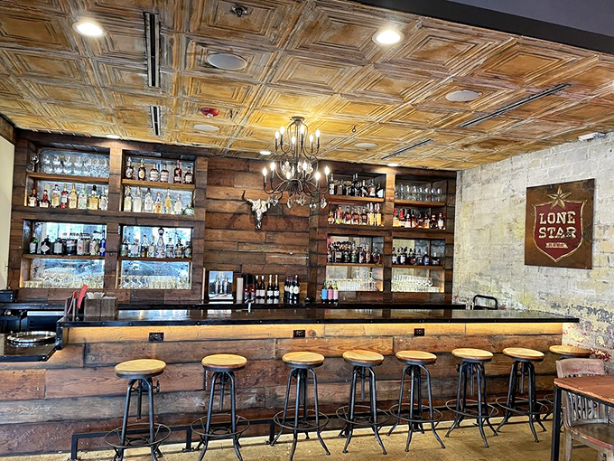 The bar area combines rustic Texas charm with urban sophistication&mdash;proof that barbecue and craft cocktails are a match made in Houston heaven.