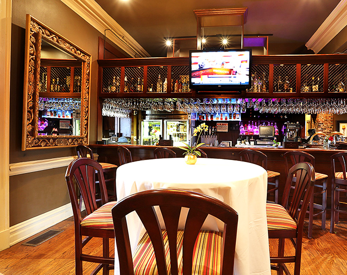 The bar area strikes that perfect balance between "fancy enough for a celebration" and "comfortable enough to become a regular."