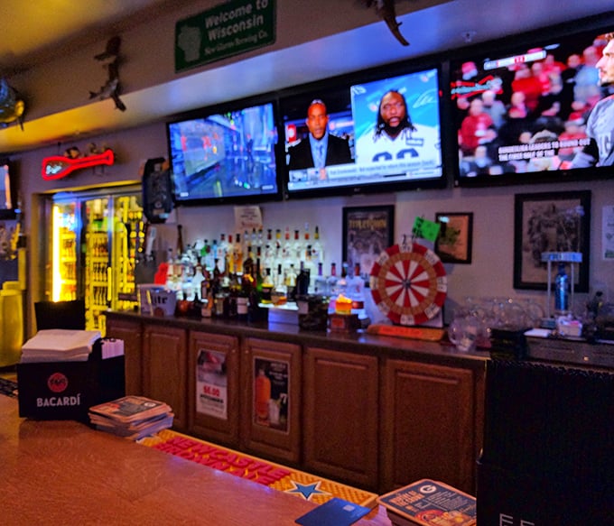 A bar setup that says "pull up a stool and tell me your troubles." The "Welcome to Wisconsin" sign isn't just decoration &ndash; it's a promise.